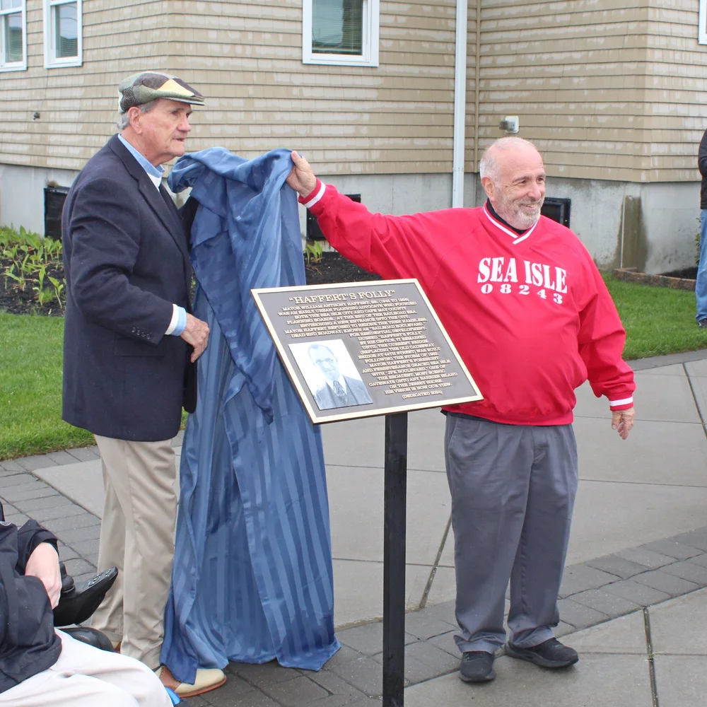 A bronze plaque honoring Mayor William Haffert was unveiled near the ...