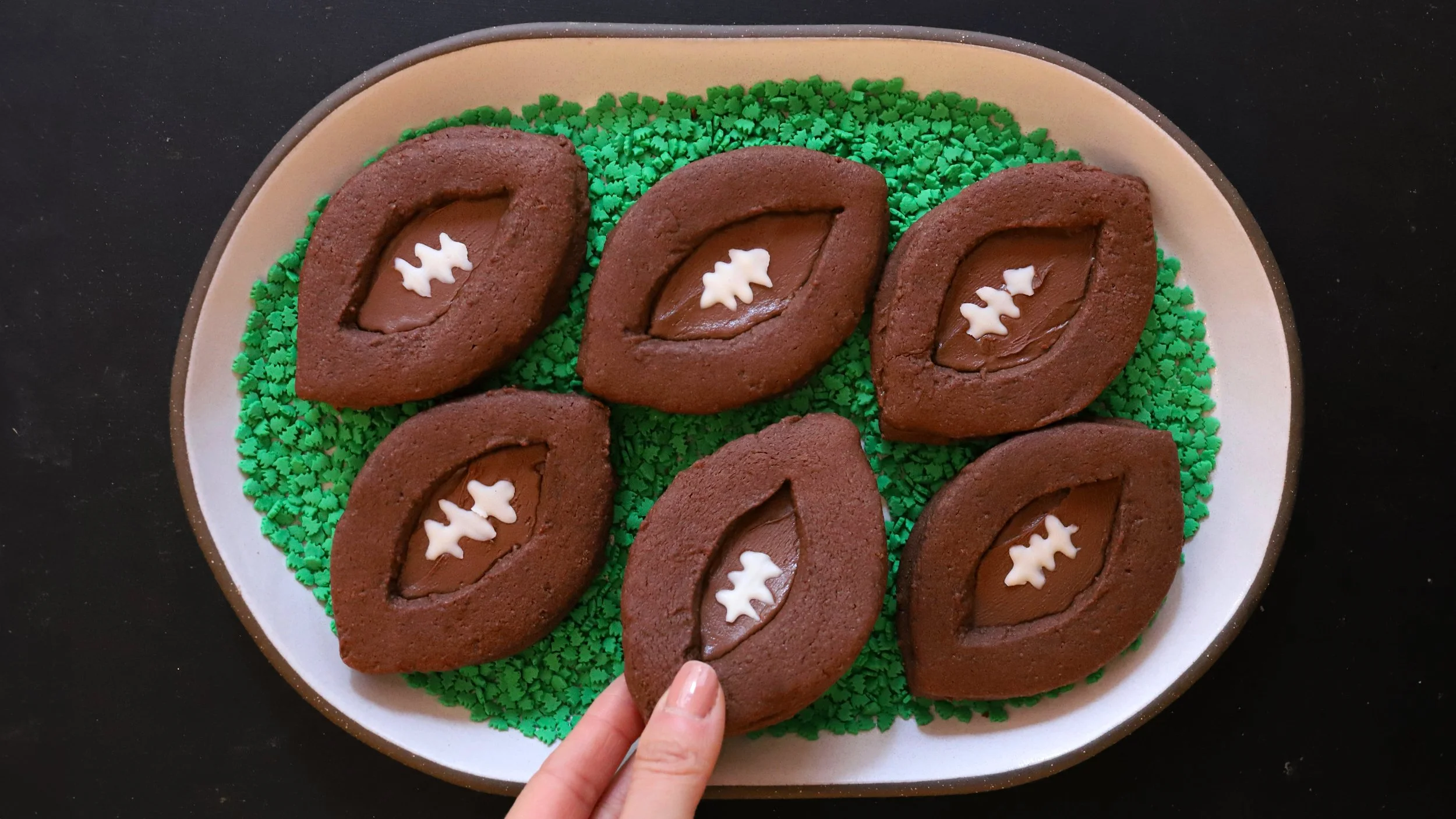 FOOTBALL SHAPED CHOCOLATE NUTELLA LINZER COOKIES — COFFEE AND CHAMPAGNE