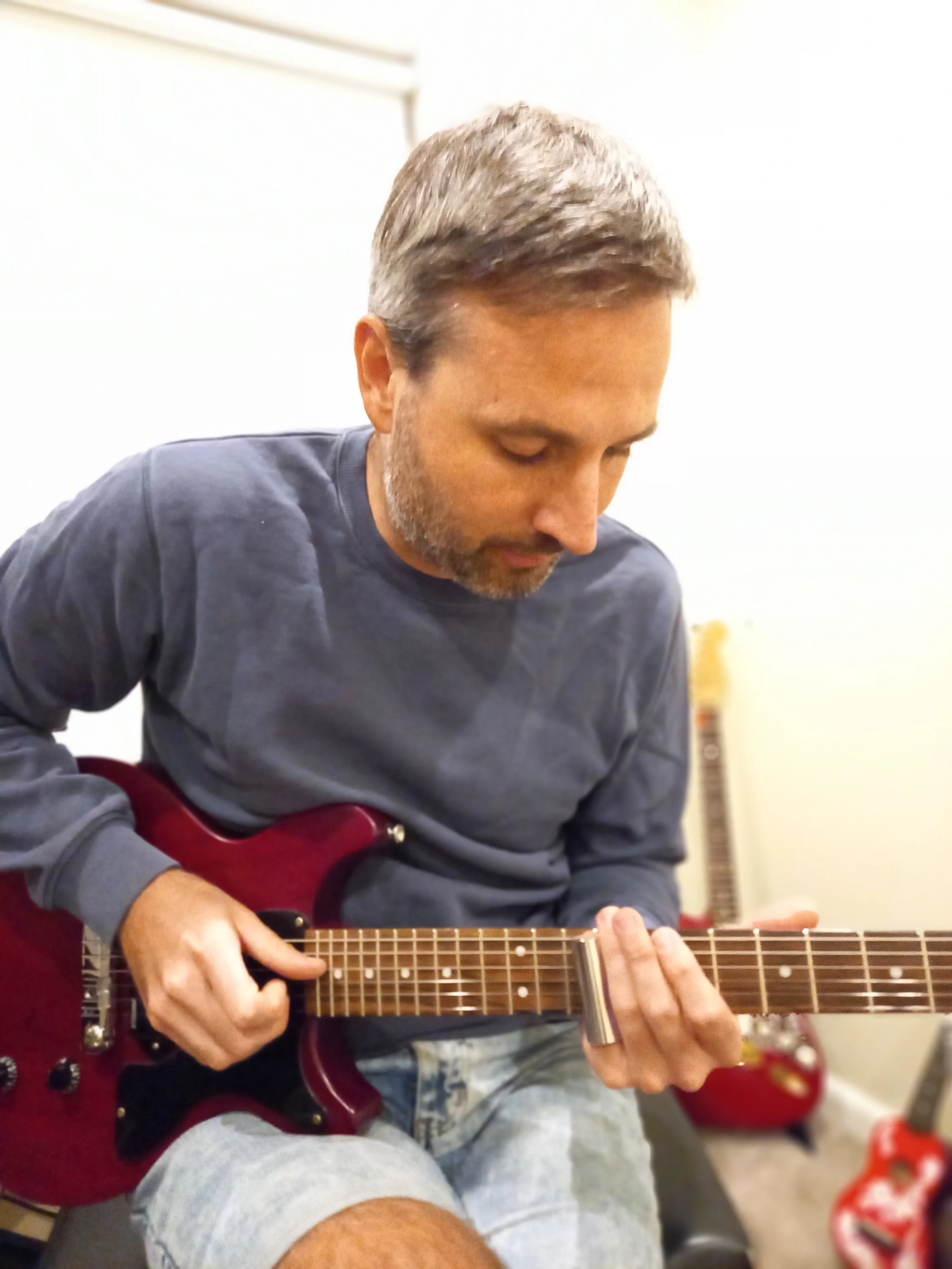 Slide Guitar Lessons with Dylan Kay — One Finger Guitarist