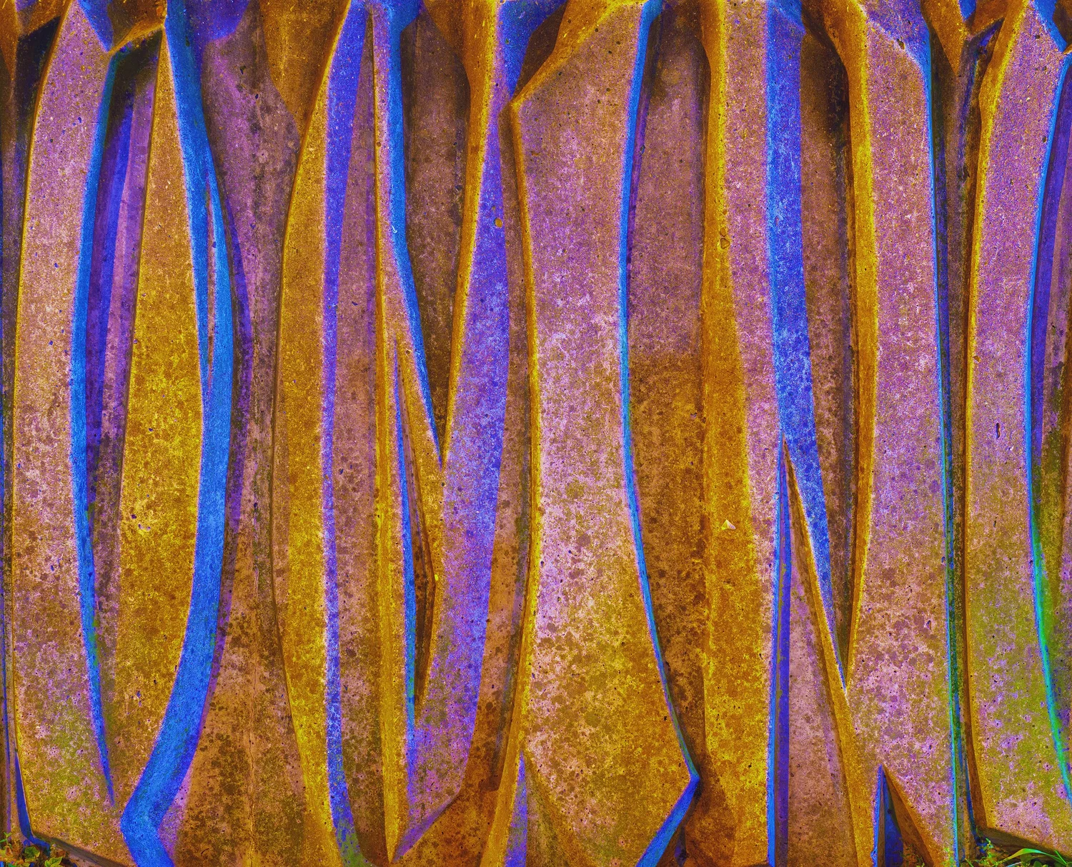 Concrete murals and reliefs photographed at night in a colourful style ...