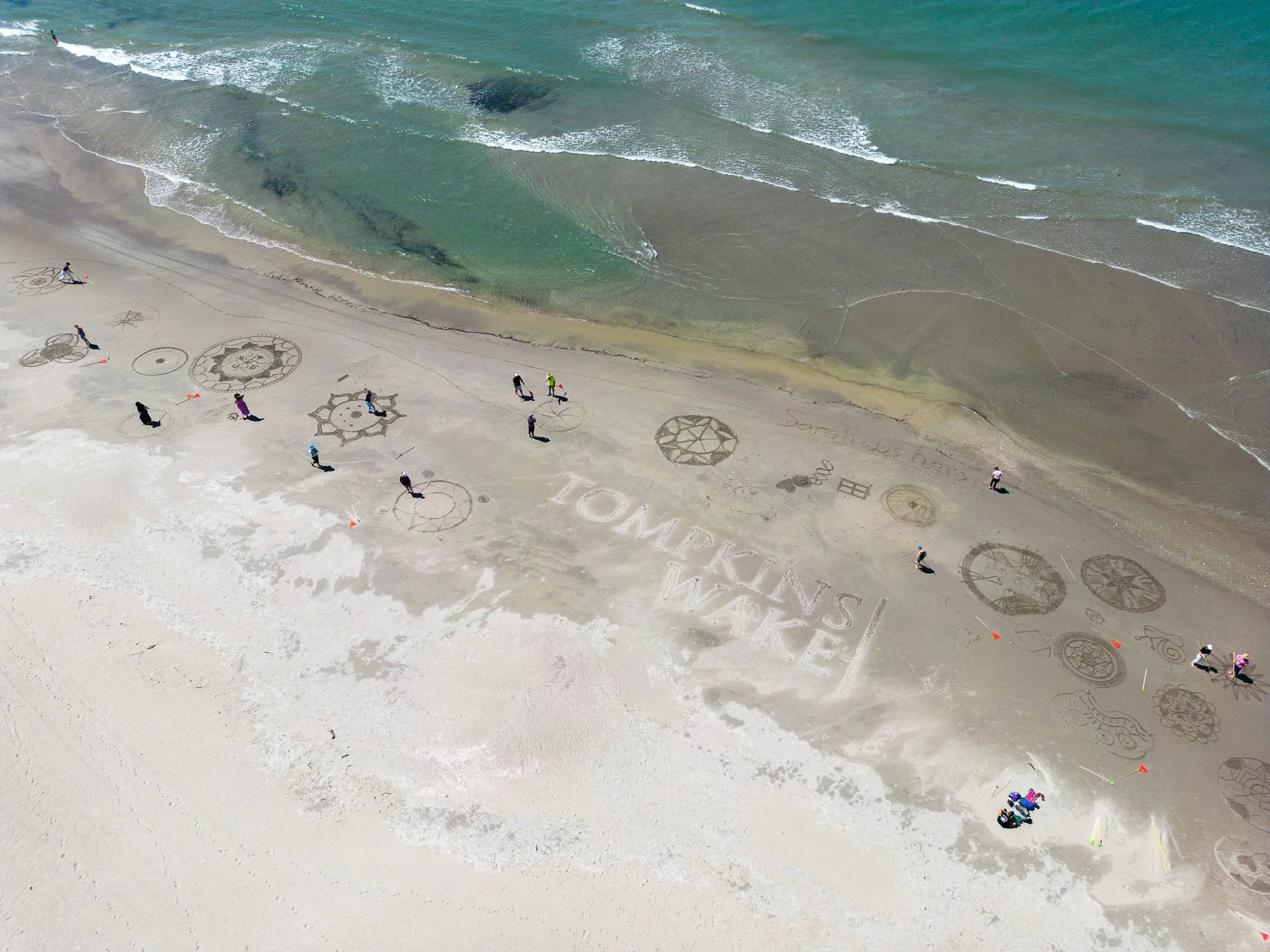 Tompkins Wake Team Building — Rake Healing - New Zealand Sand Artist