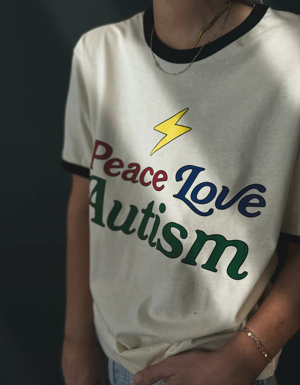 Happy Noises Purple Tee — PEACE LOVE AUTISM