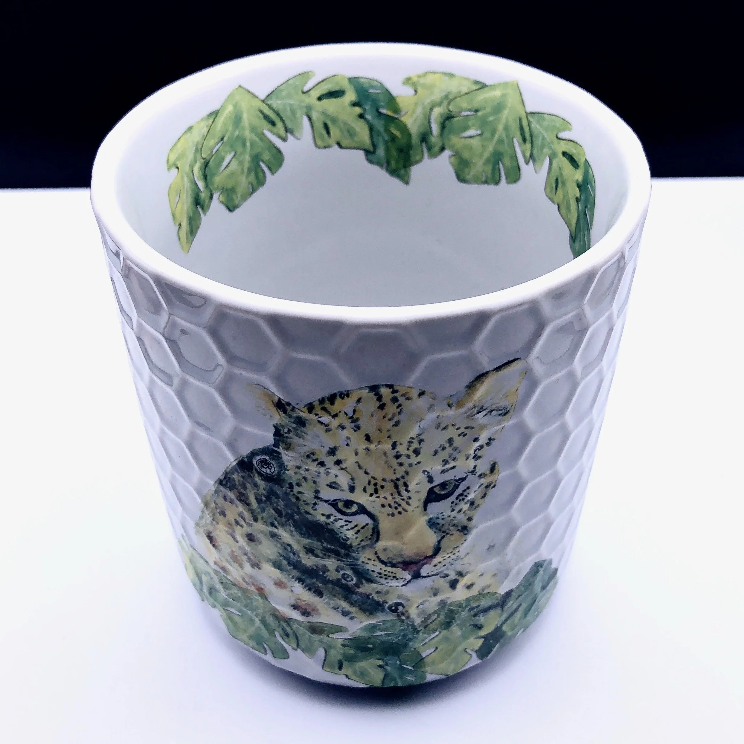 Upcycled grey container with a leopard — The Jolly Upcycler
