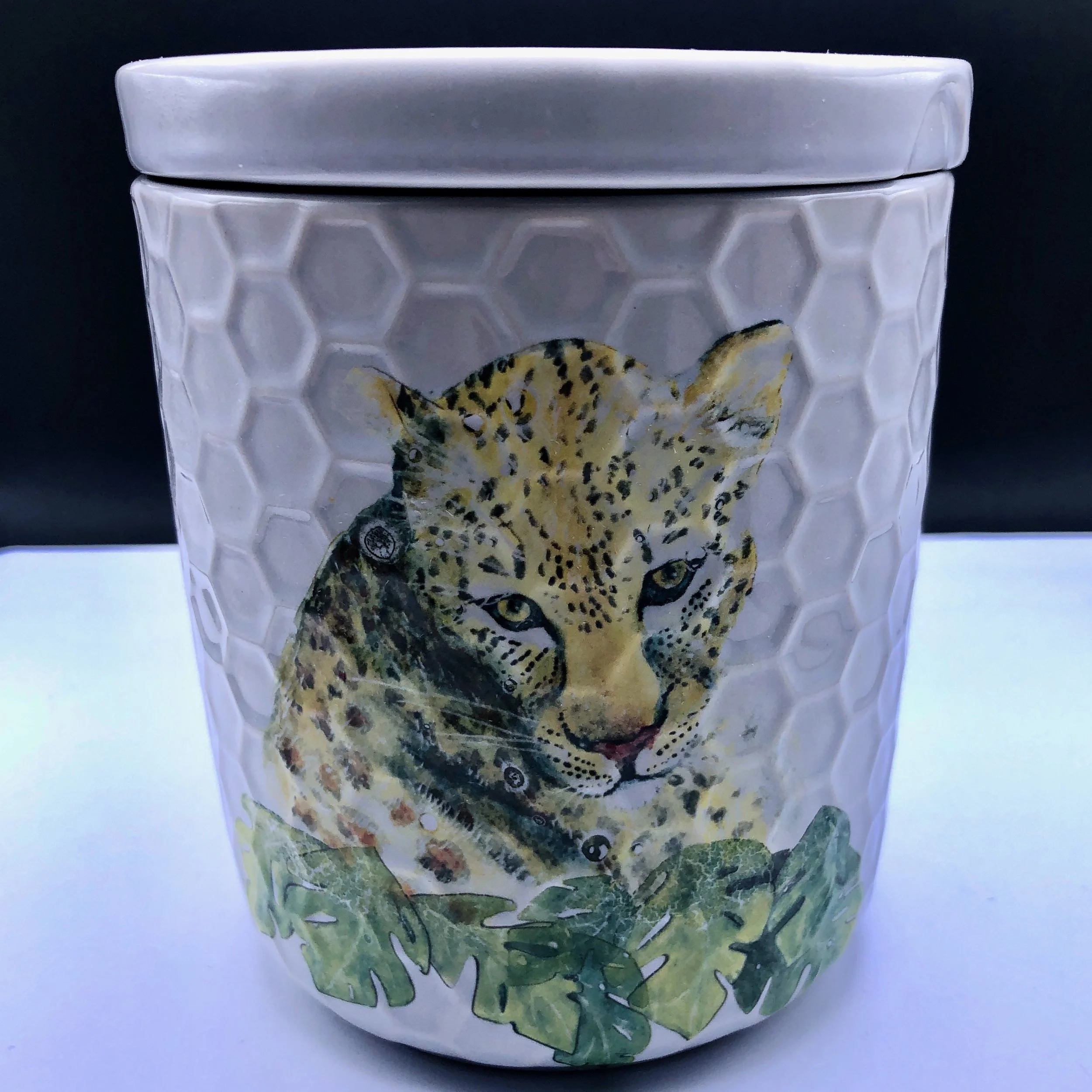 Upcycled grey container with a leopard — The Jolly Upcycler