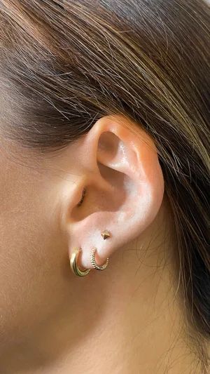 PIERCING — UPLIFT TATTOO & PIERCING