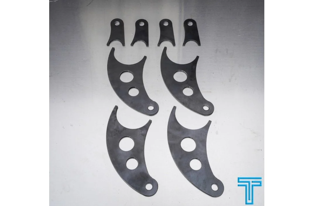 Adjustable Rear Shock Relocation Kit — TRICK'D TOYS