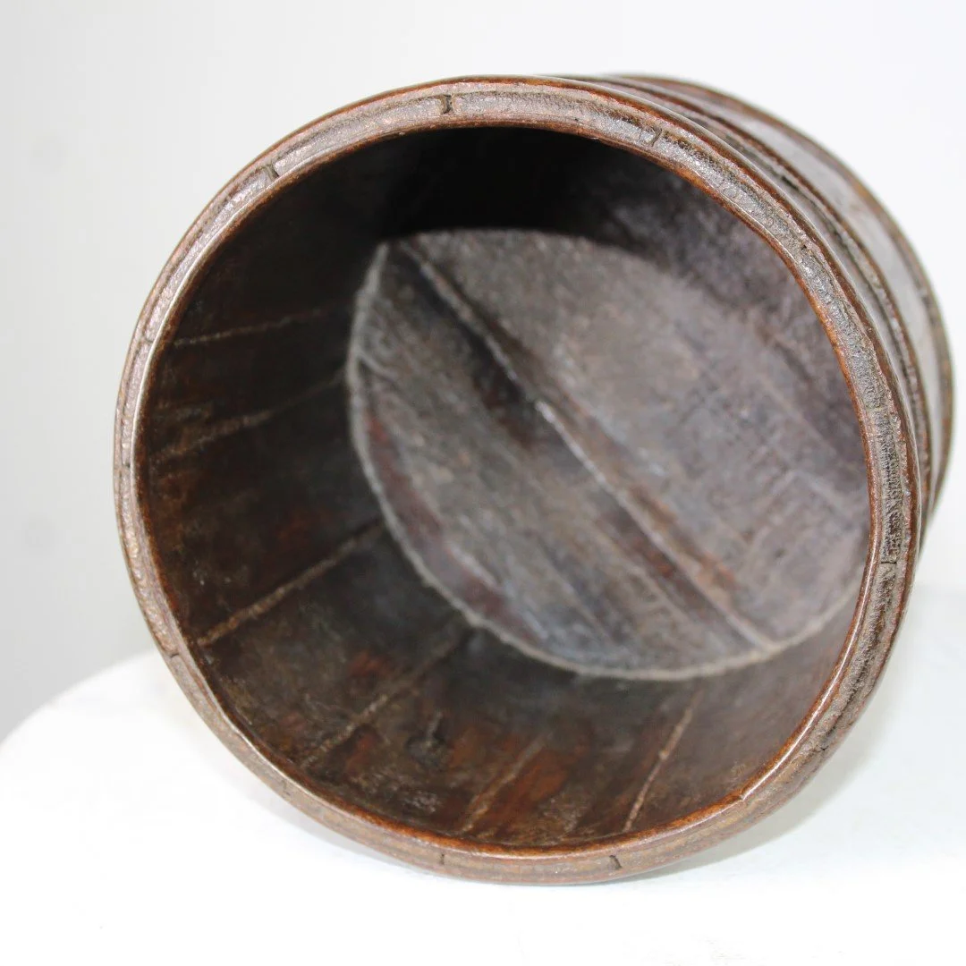 Vintage coopered wooden barrel plant pot with steel bands