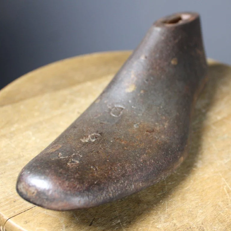 Early 20th century industrial antique cast iron shoe last