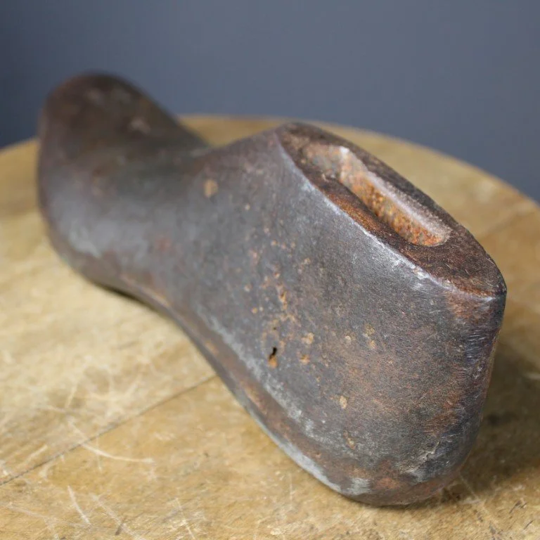 Early 20th century industrial antique cast iron shoe last