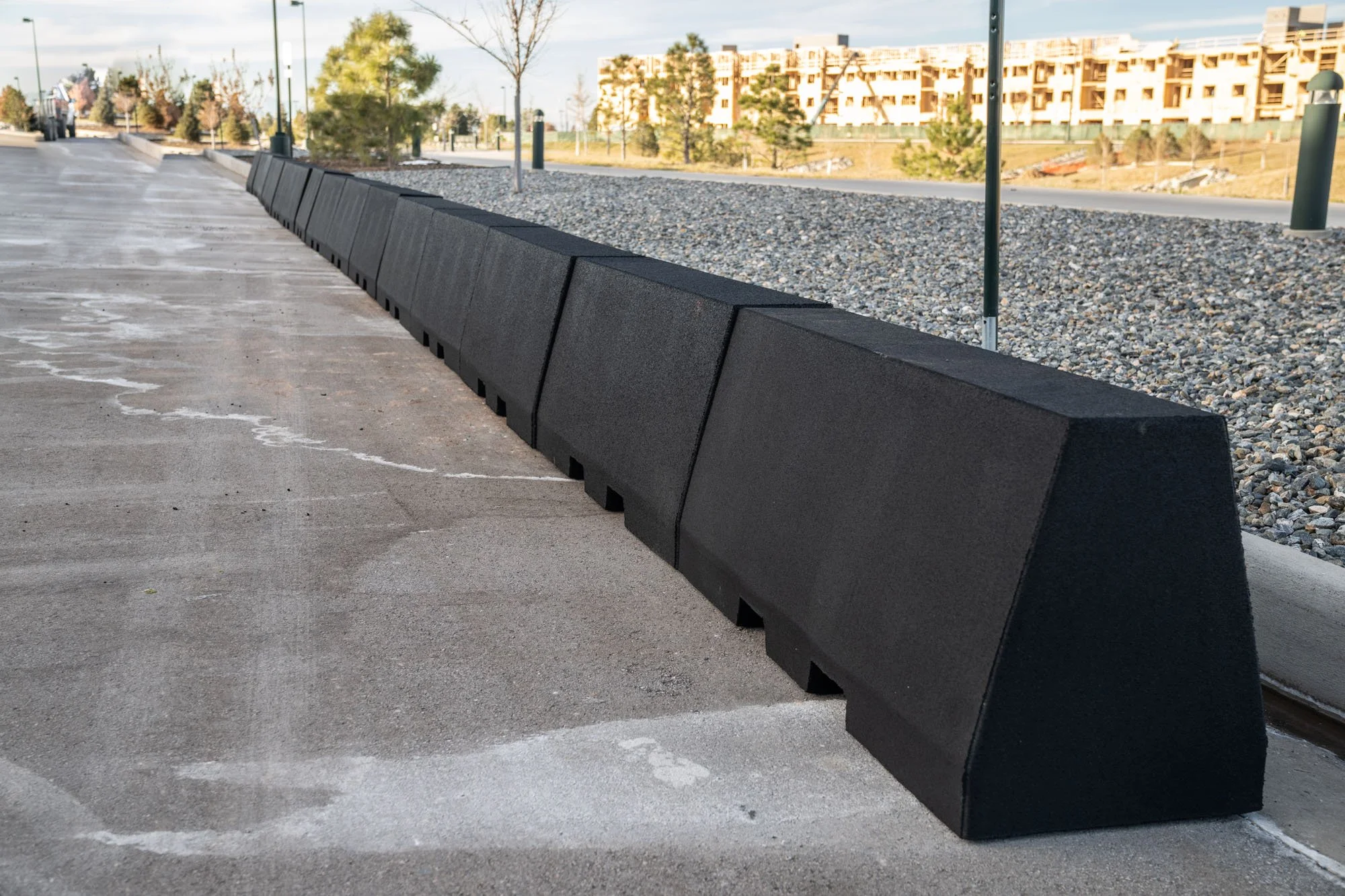 Concrete barrier alternatives made from recycled waste tires