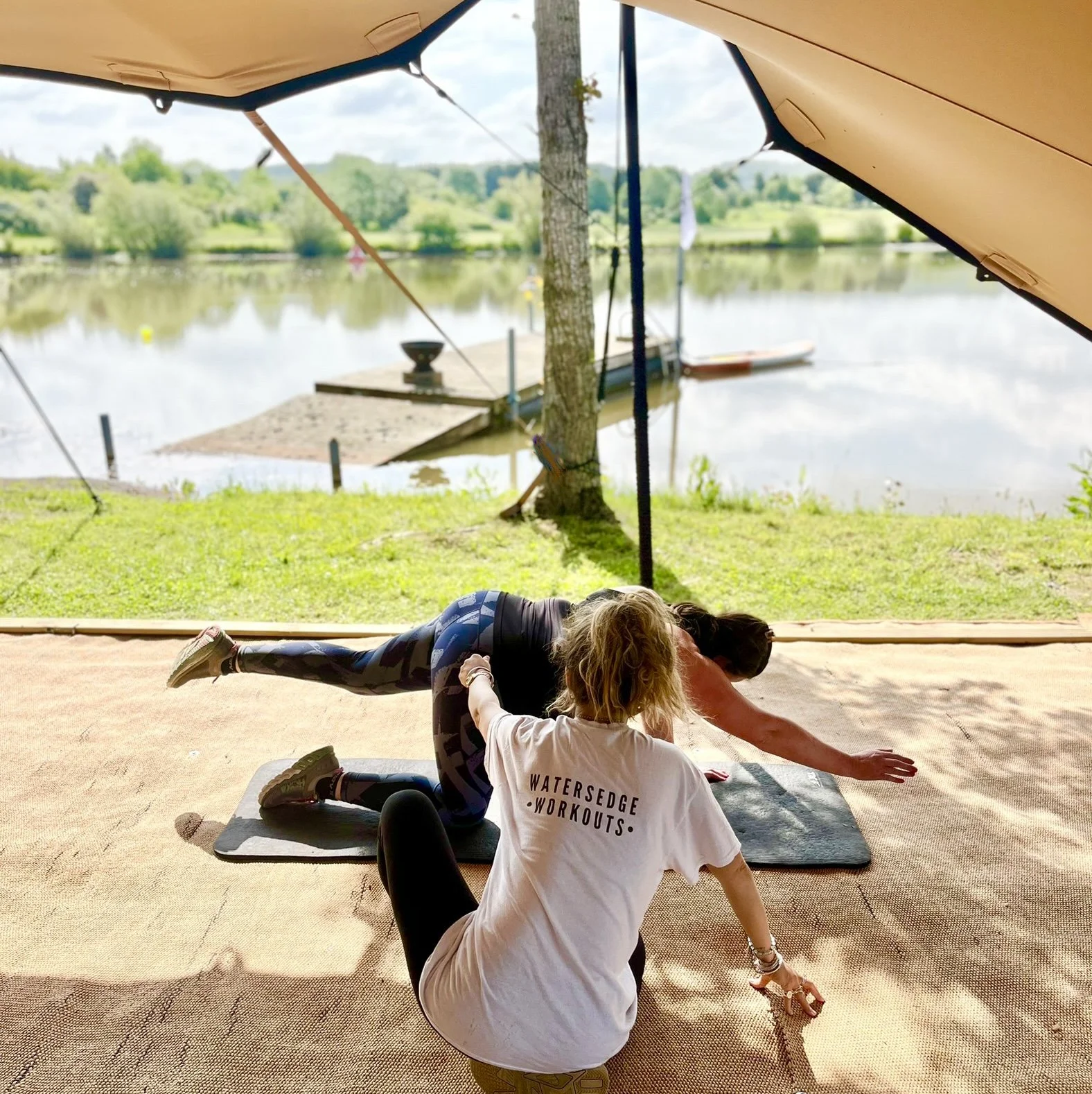 Fun and motivating fitness classes in the outdoors looking over the ...