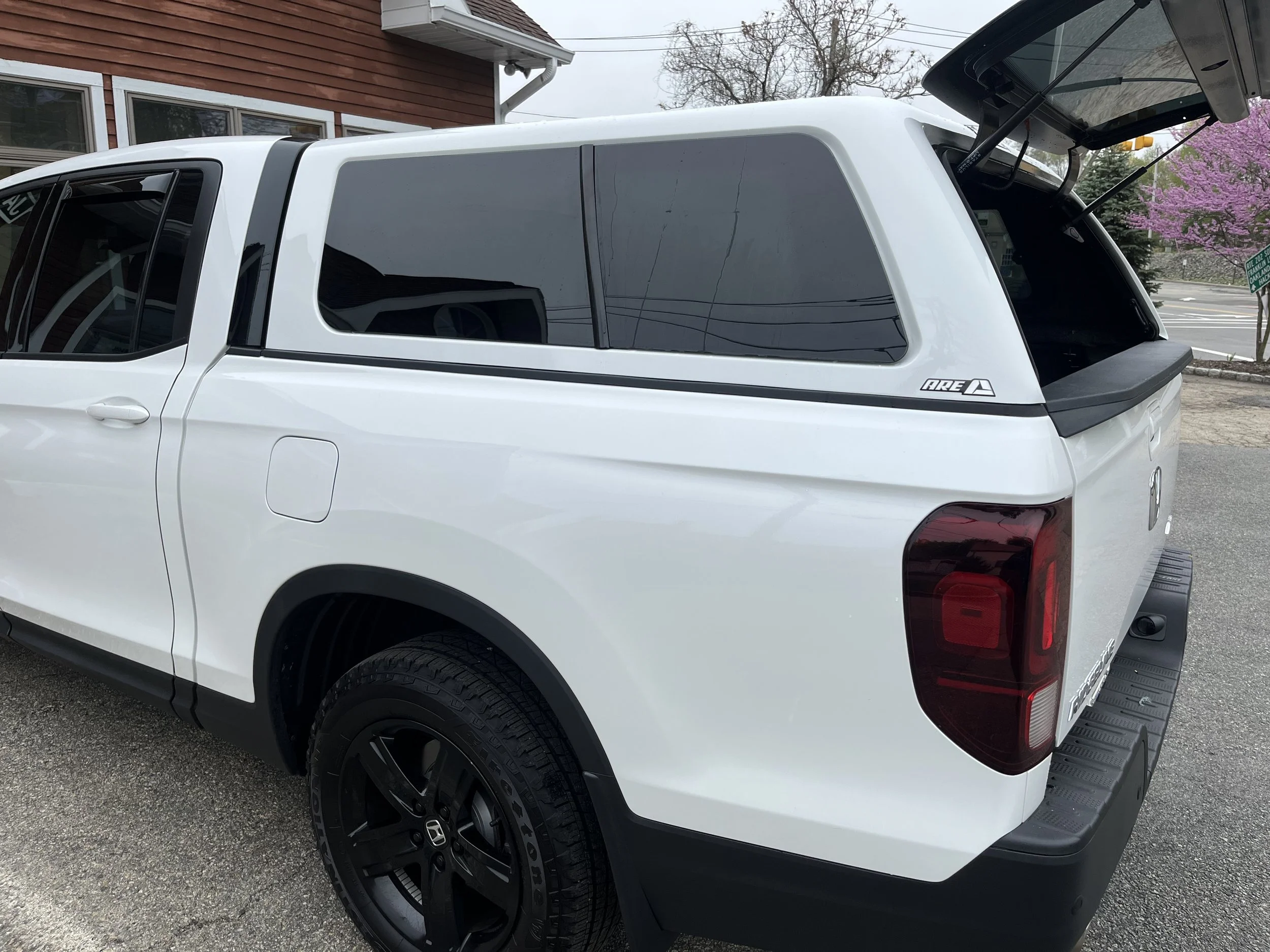 Honda Ridgeline with ARE Z Series Cap — suburbancaps.com