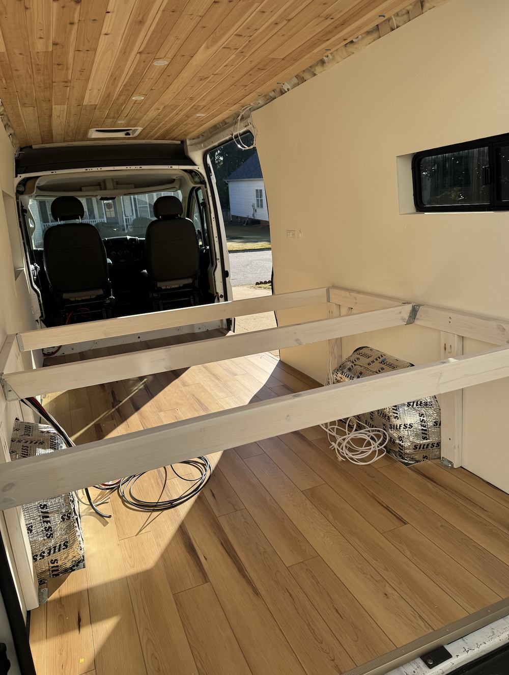 Building a Sturdy and Space-Saving Bed Frame for Our Ram ProMaster Van ...