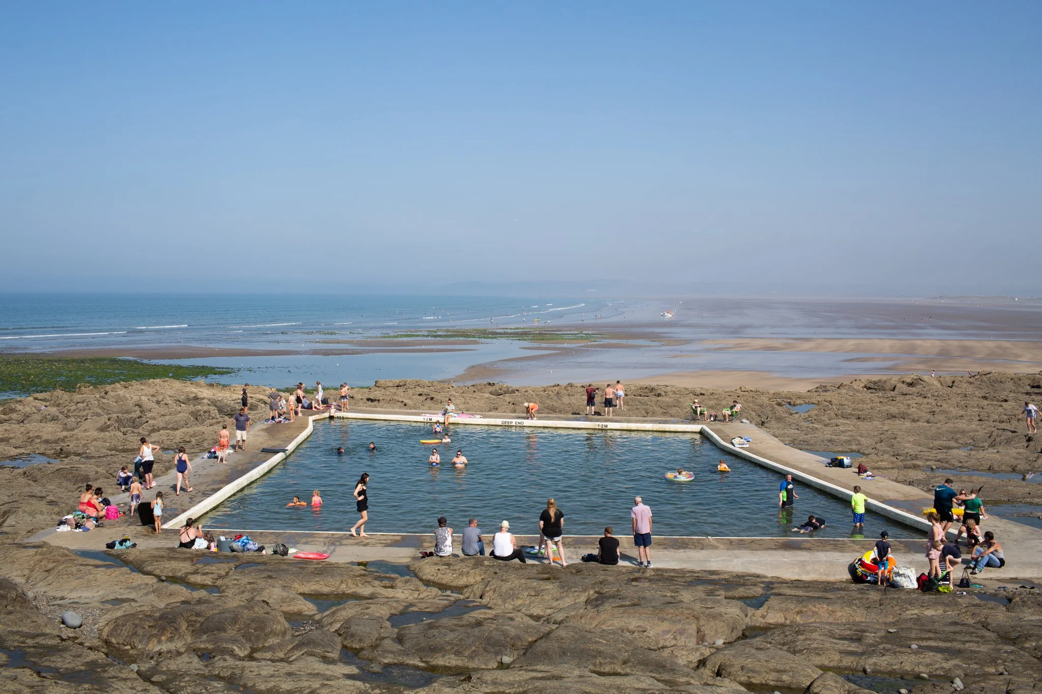 Photographs of the English coastal landscape document seaside life ...