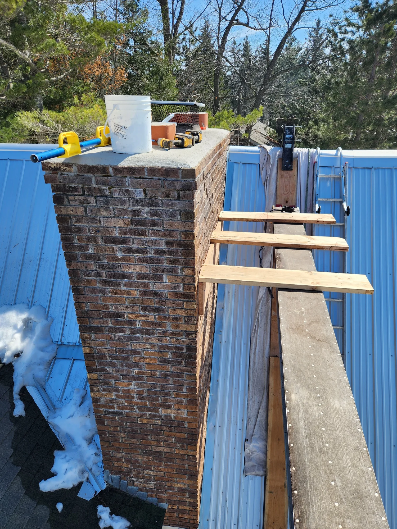 Tall Chimney and Large Chimney Crown — MN's Chimney Experts