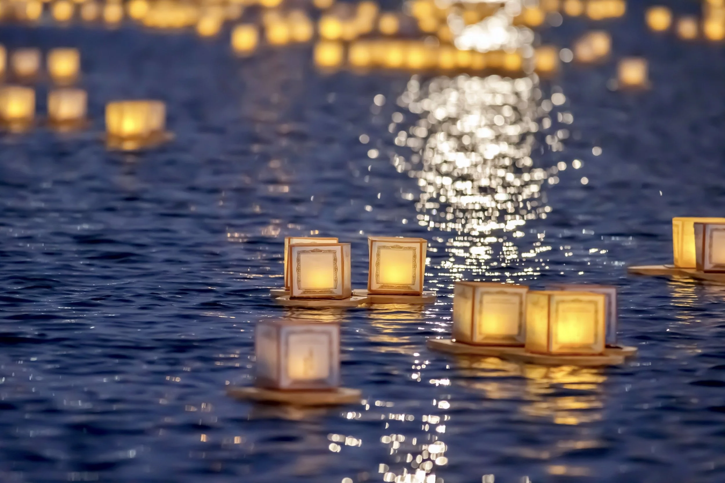 See Thousands of Glowing Lights Drifting Across the Lake at the Water ...