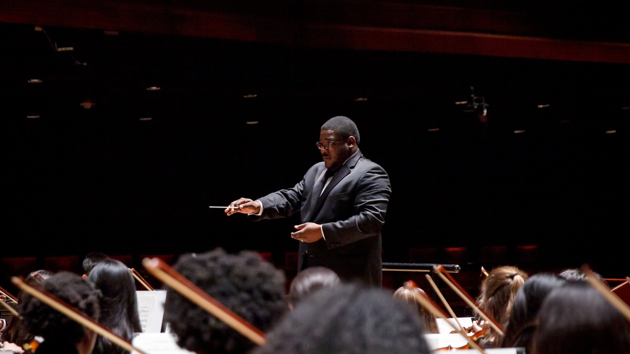 About — Kenneth T. Bean, Conductor