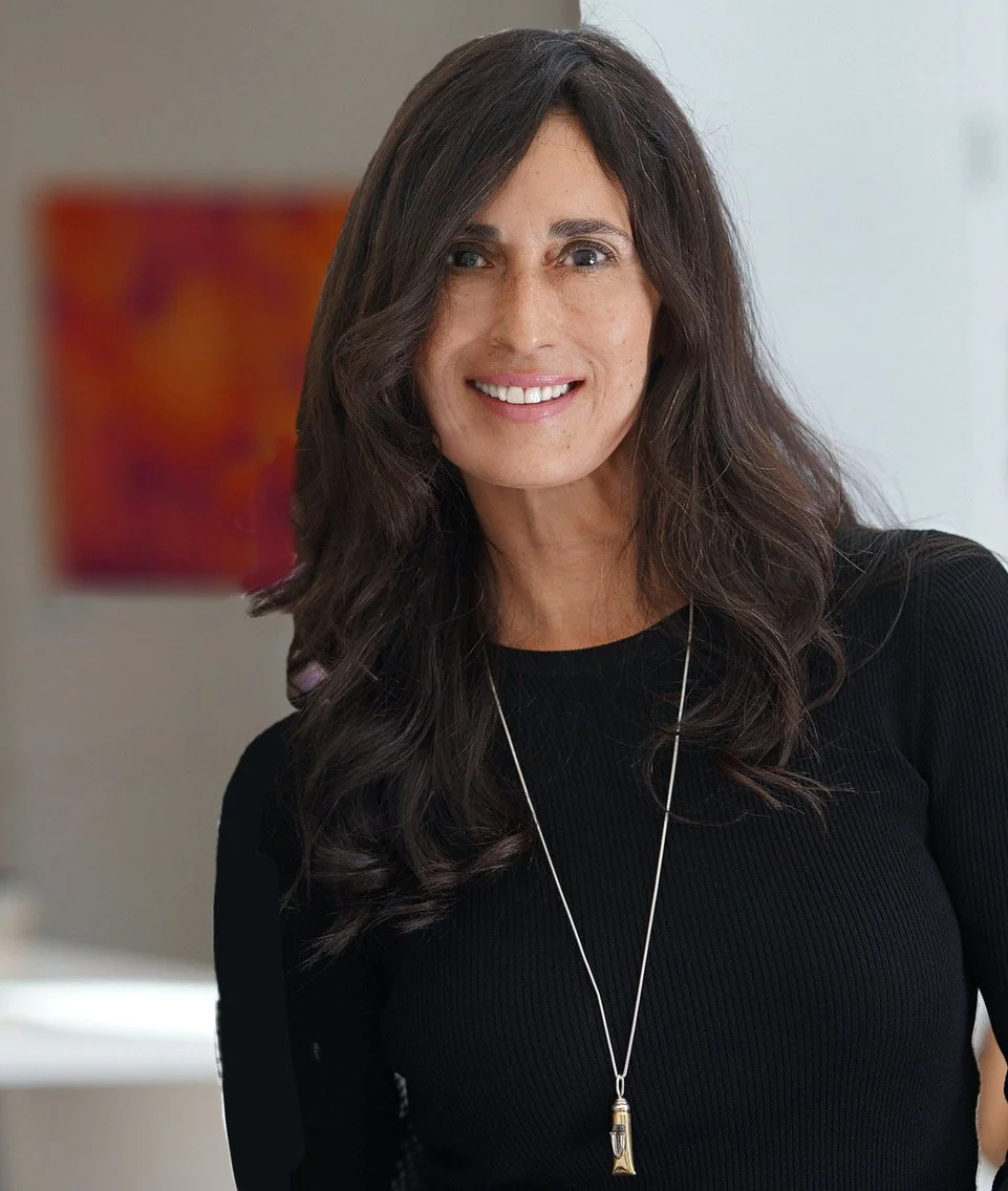 ABOUT — GINA RAPHAELA