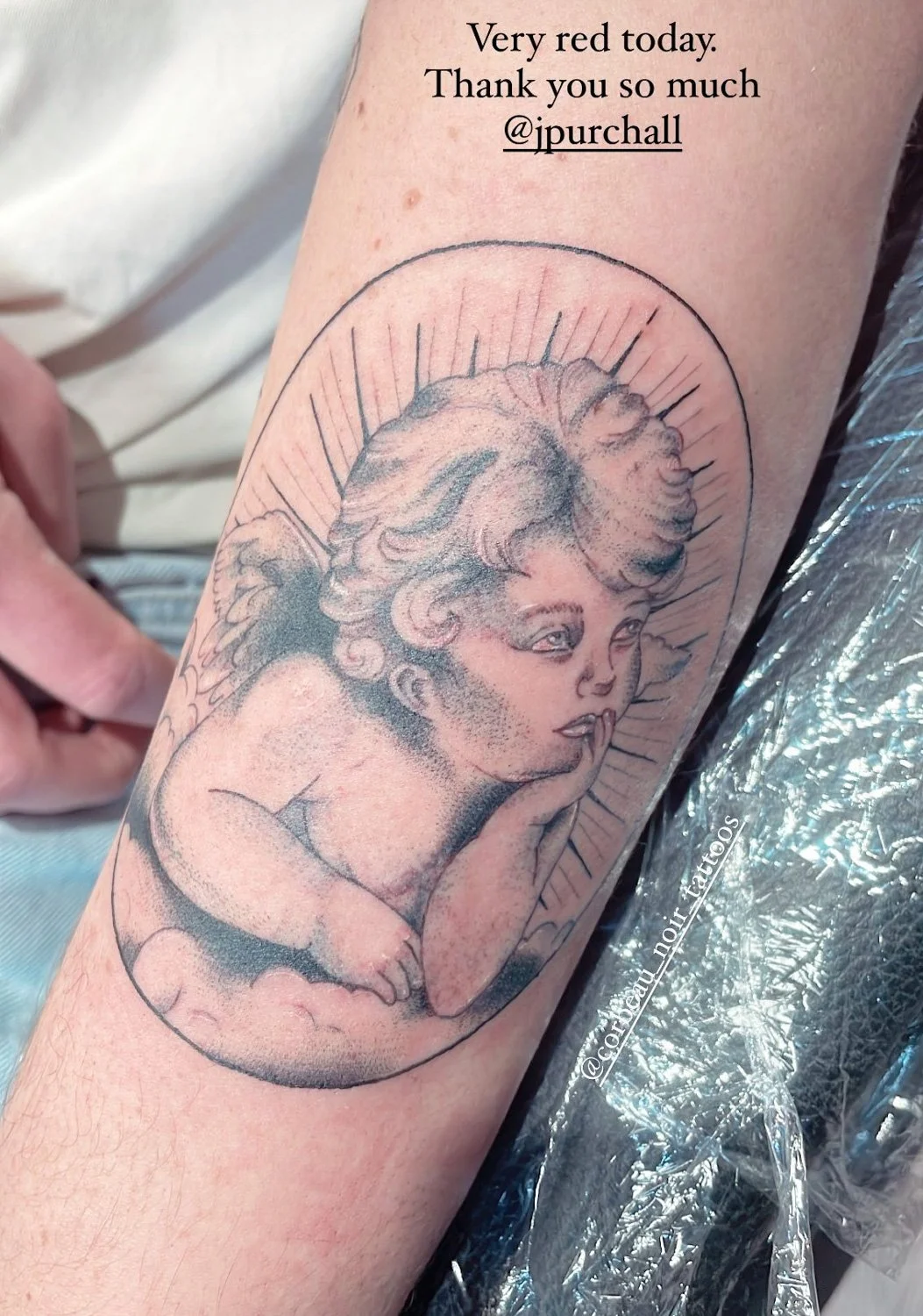 Baby Angel Tattoo Arm