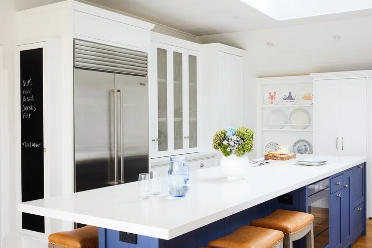 A stylish blue kitchen design with heart