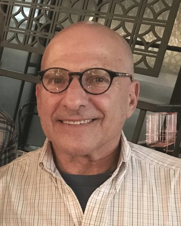 about — john greenhut