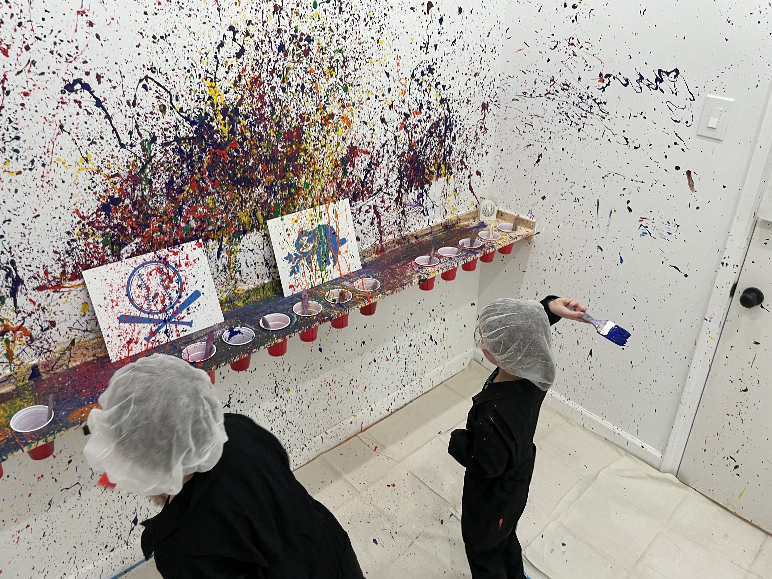 Splatter Paint room at Cuts N Curls For Boys & Girls — CLE With Kids