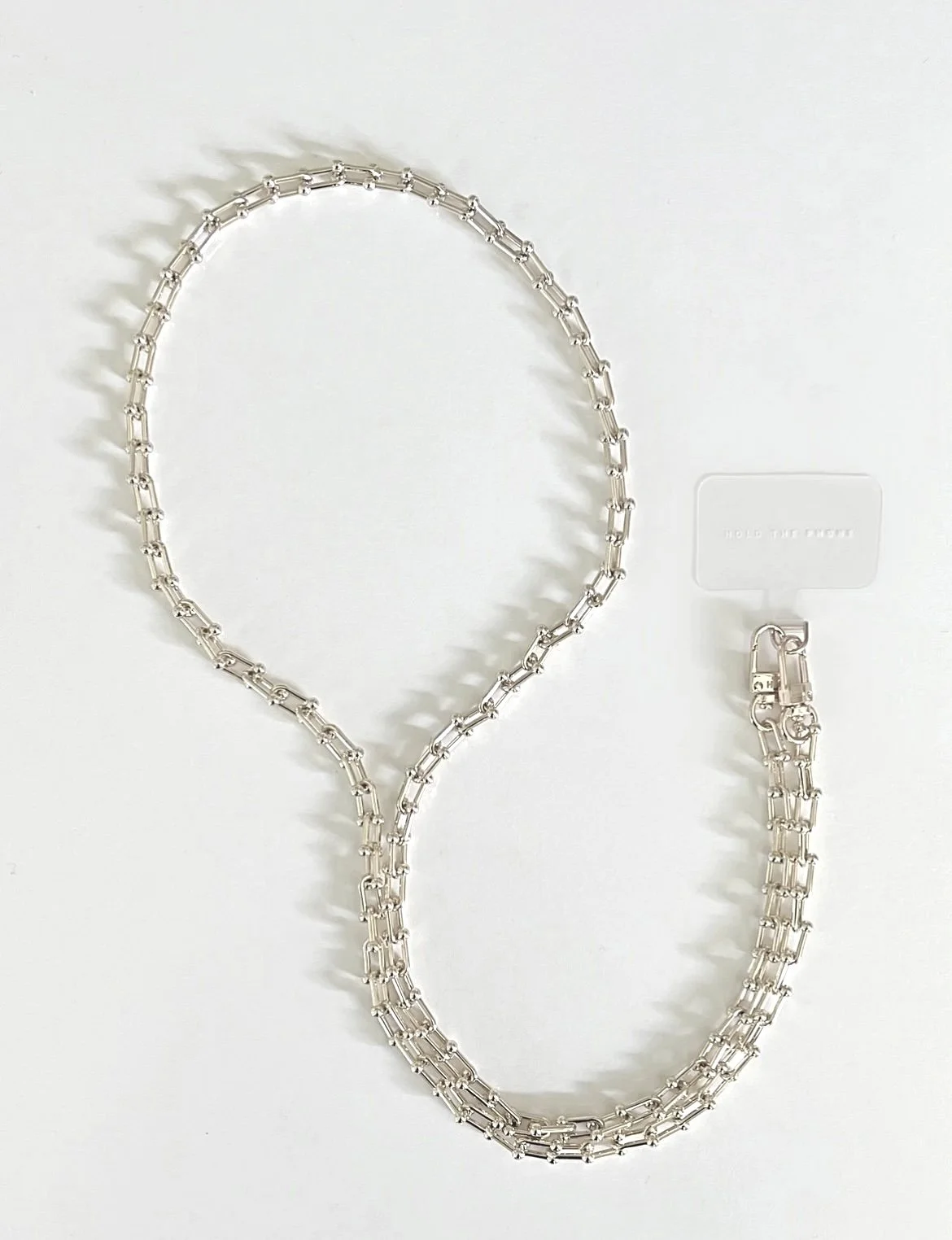 Phone cords, chains and cases for iPhone and Android — HOLD THE PHONE