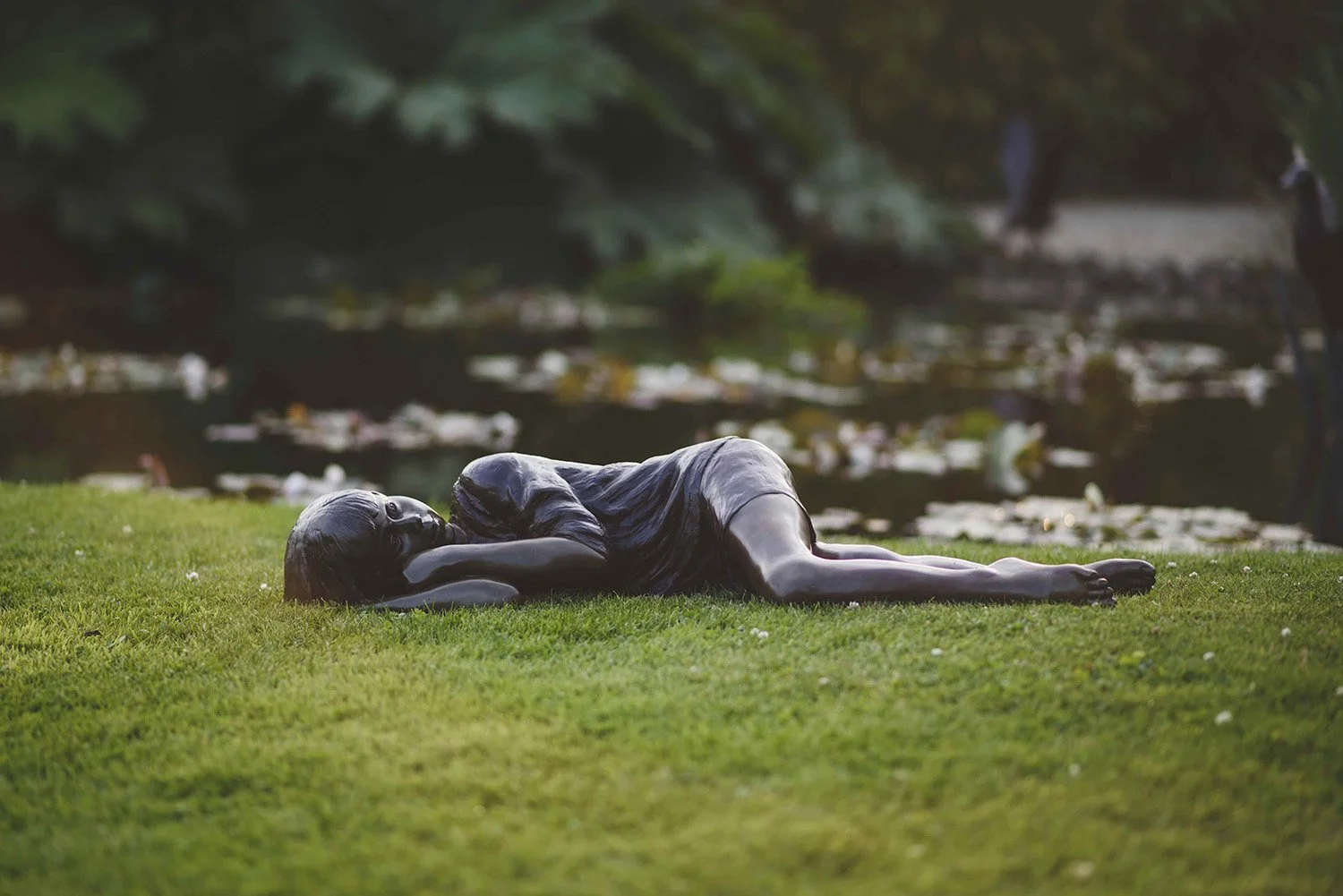 Resting Child Bronze Sculpture — Le Blanc Fine Art
