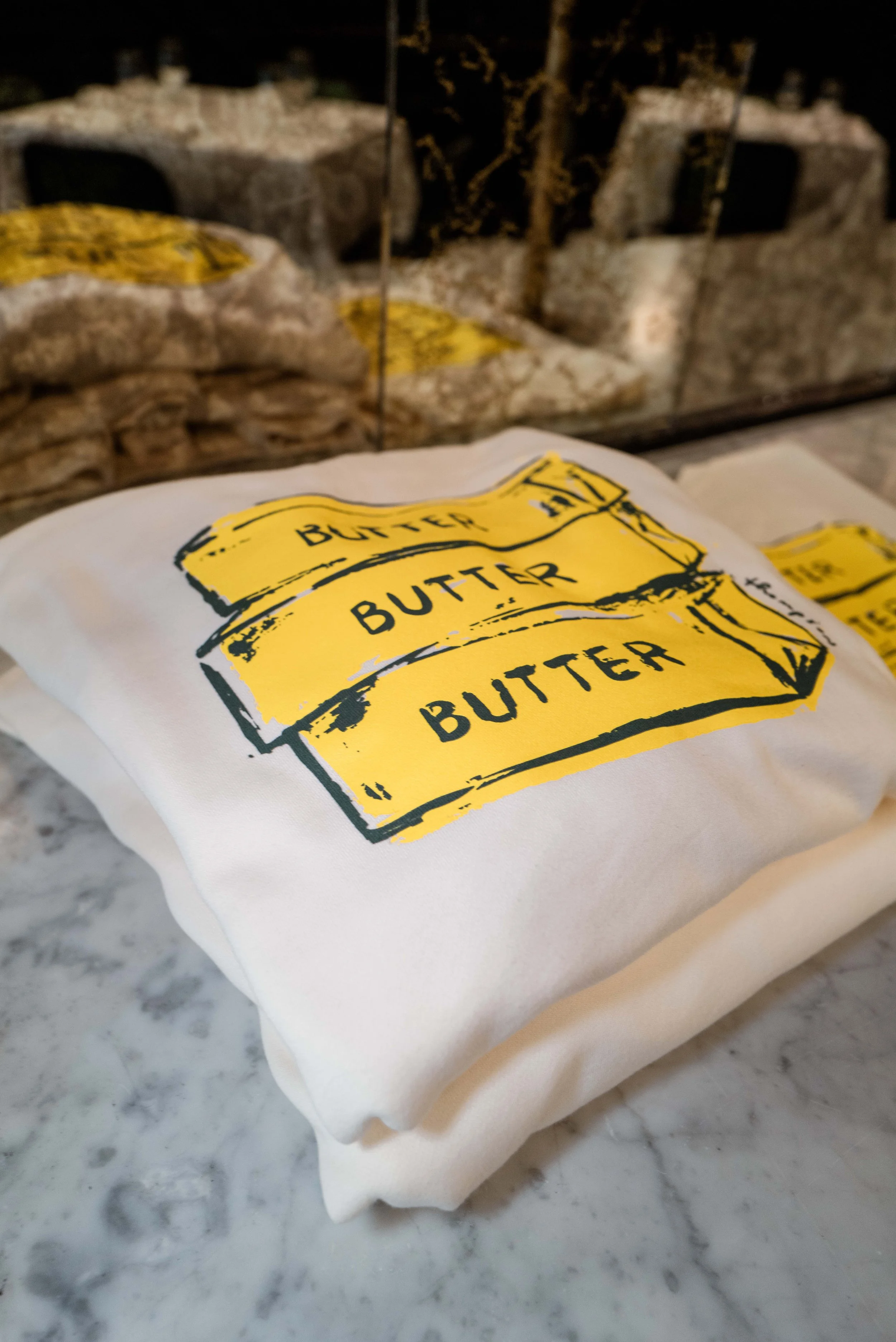 Merch — Petit Trois