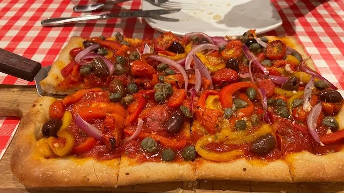 About Elio's — Elio's Pizzeria