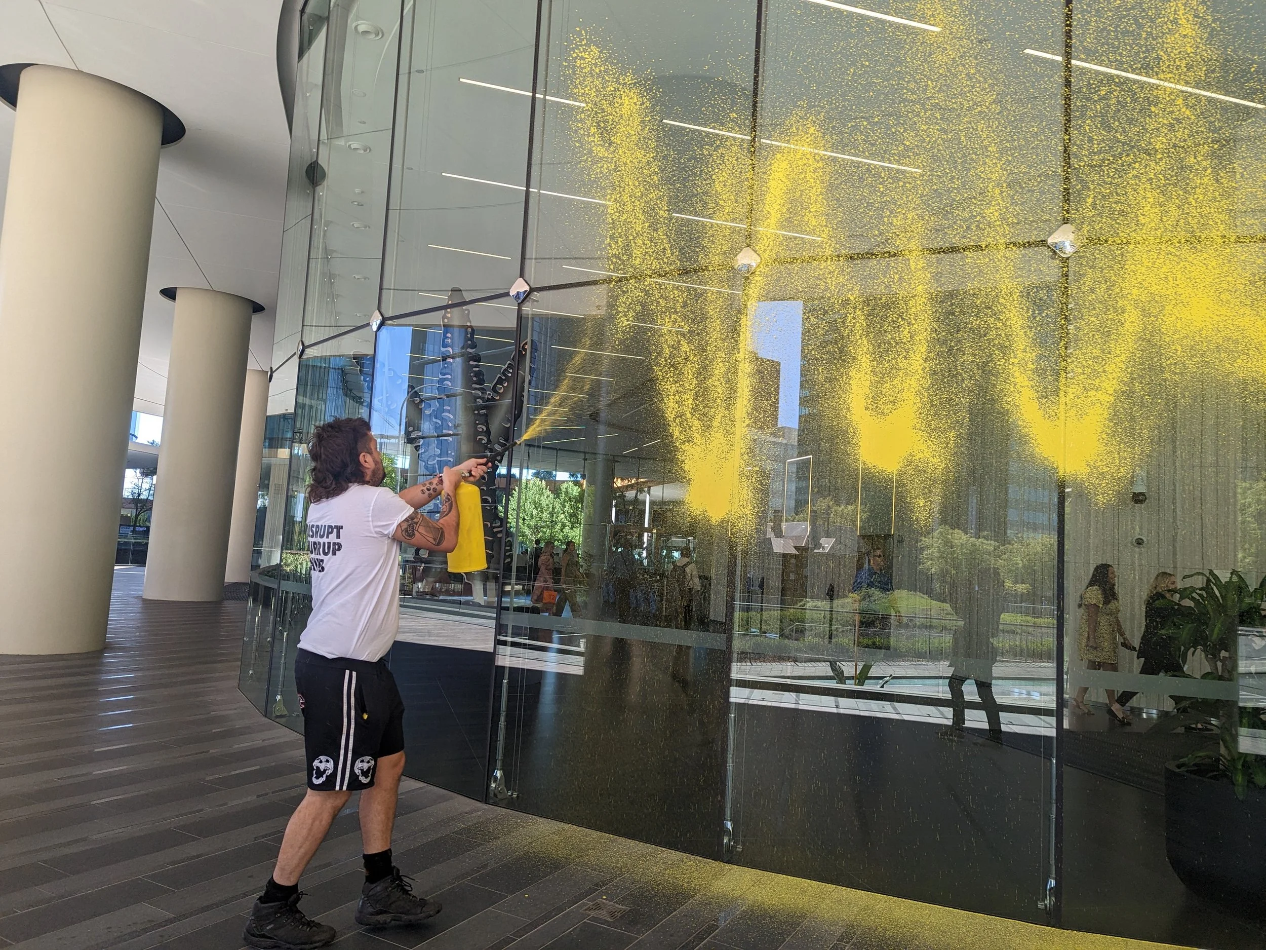 Punk uses fire extinguisher to spray yellow paint all over Woodside ...