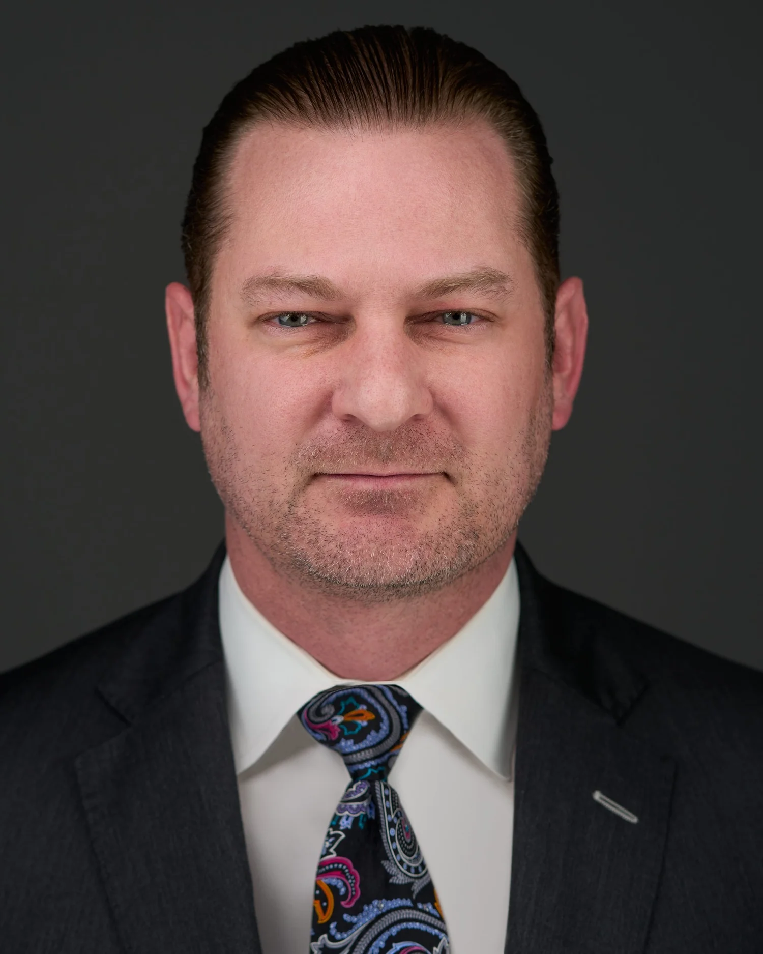 About 1 — Frisbie Lombardi