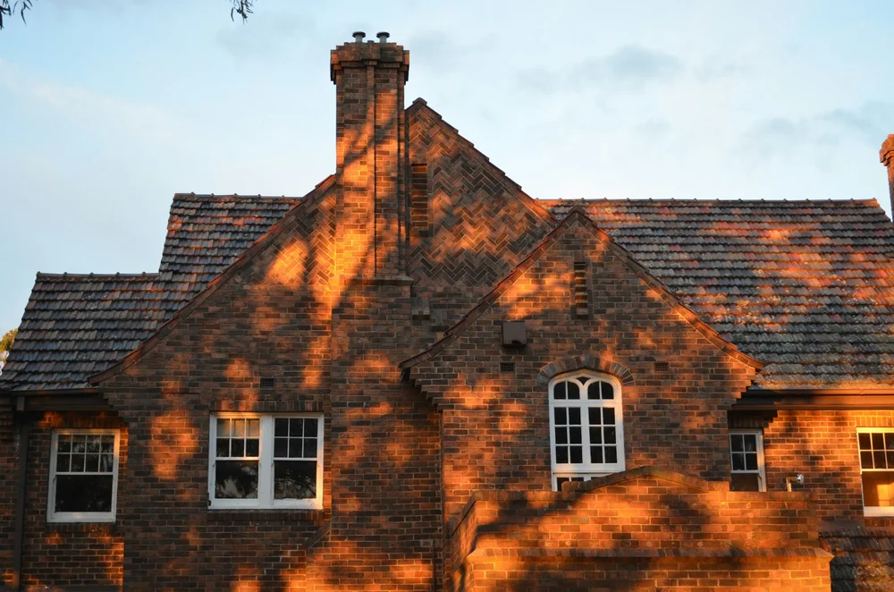 How to Choose the Perfect Roof Color for Red Brick Houses | Jeff Woods ...
