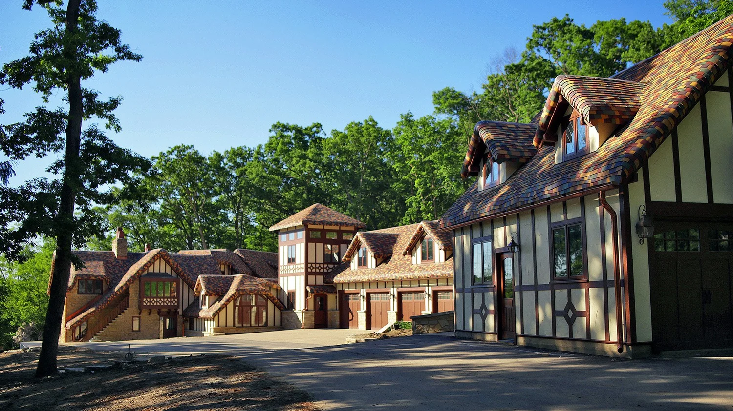 Multi-Colored Stained & Steam Bent Shingles | Huber & Associates