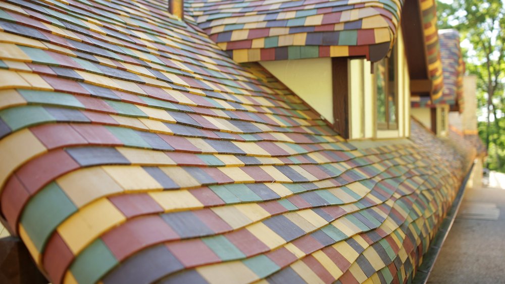 Multi-Colored Stained & Steam Bent Shingles | Huber & Associates