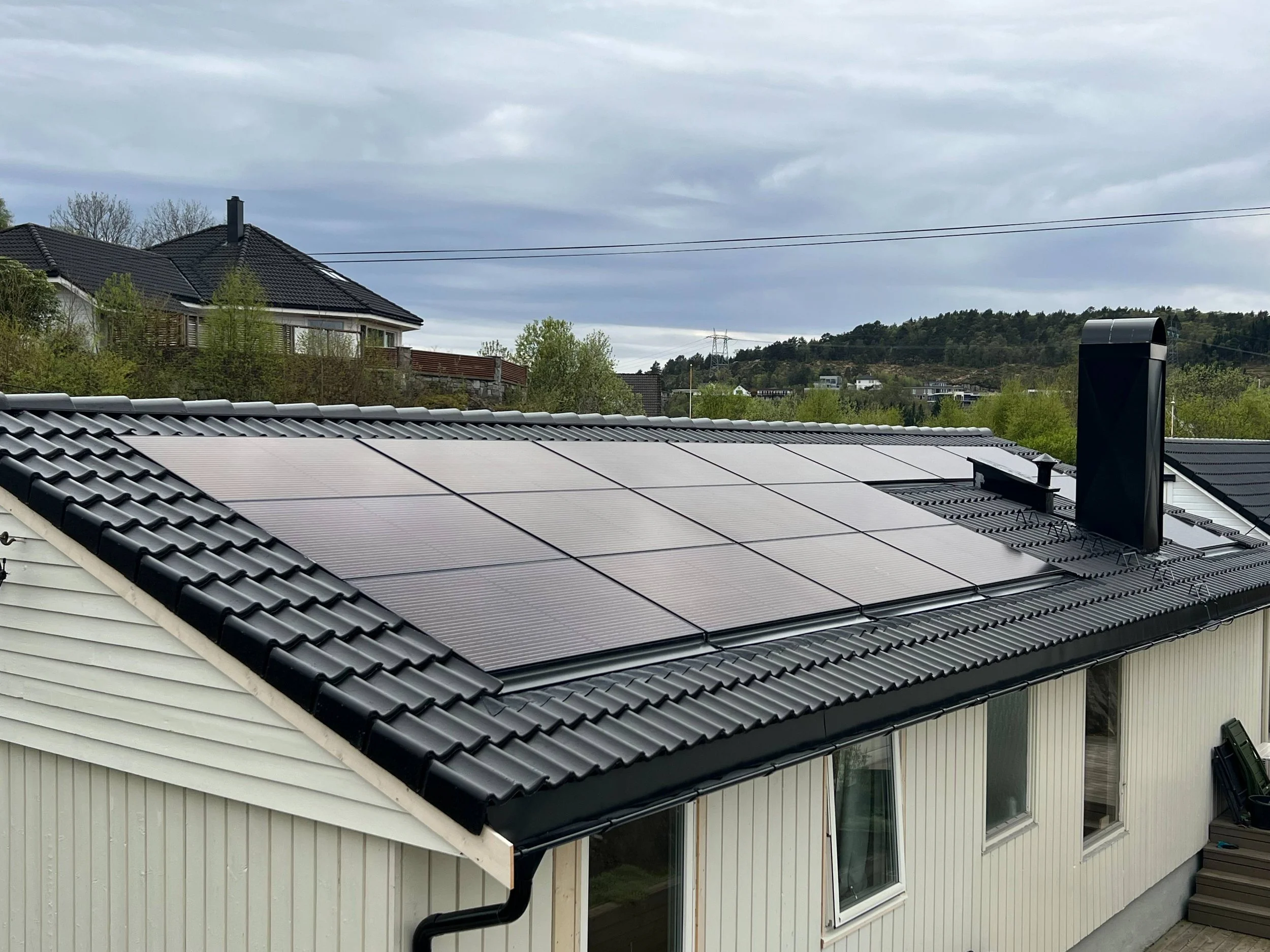 Takbytte med integrerte solcellepaneler — Suno Solceller