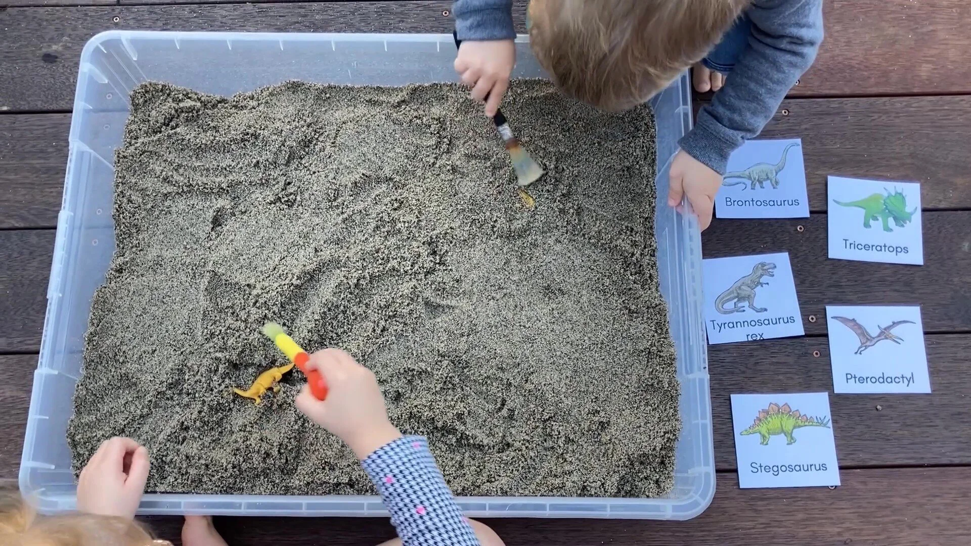 Dinosaur finding and matching sand activity — Easy Play Ideas for Kids