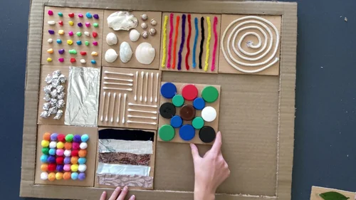 DIY Cardboard Sensory Board: Creative Ideas with Interchangeable Tiles