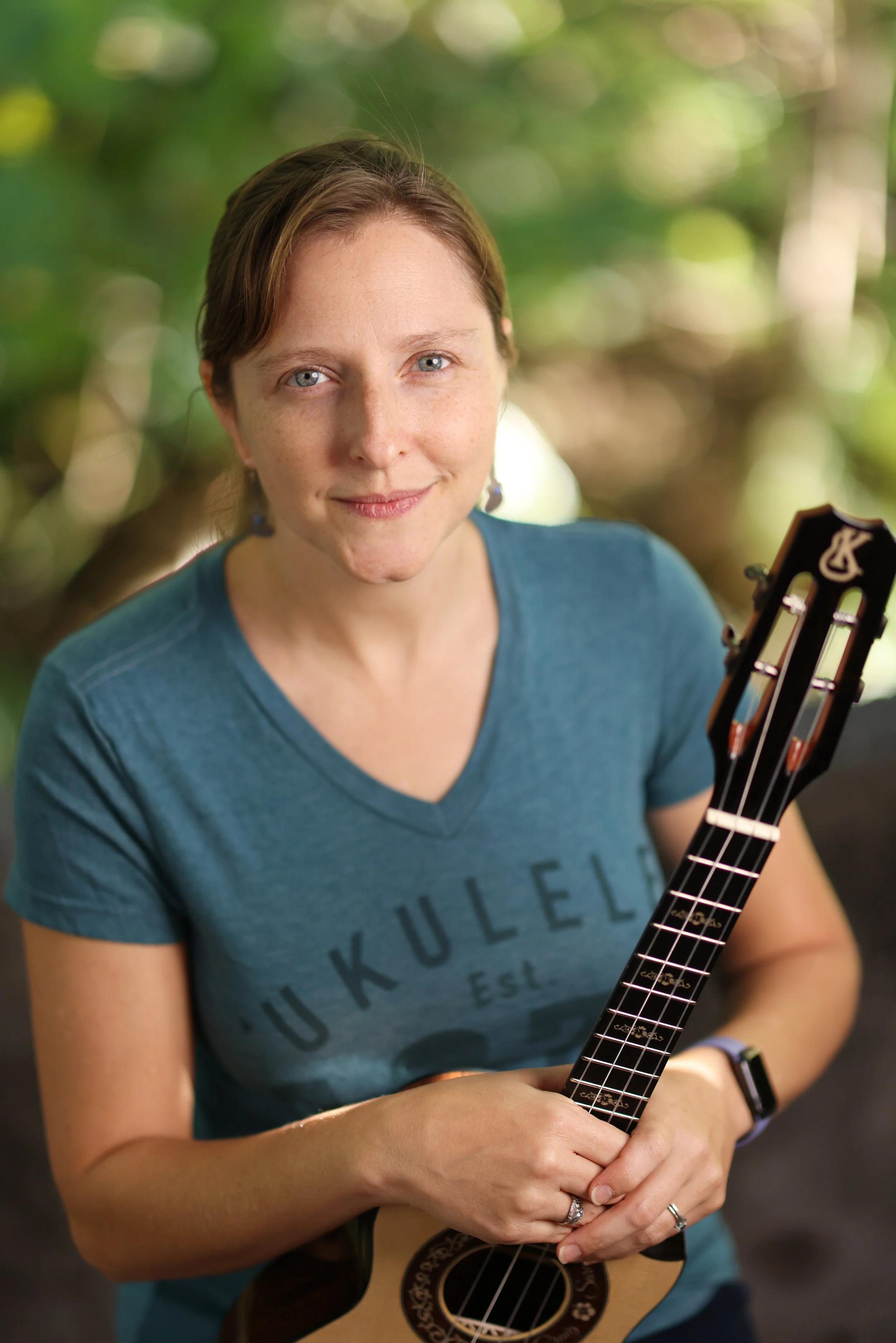 About Us — Four Strings at a Time