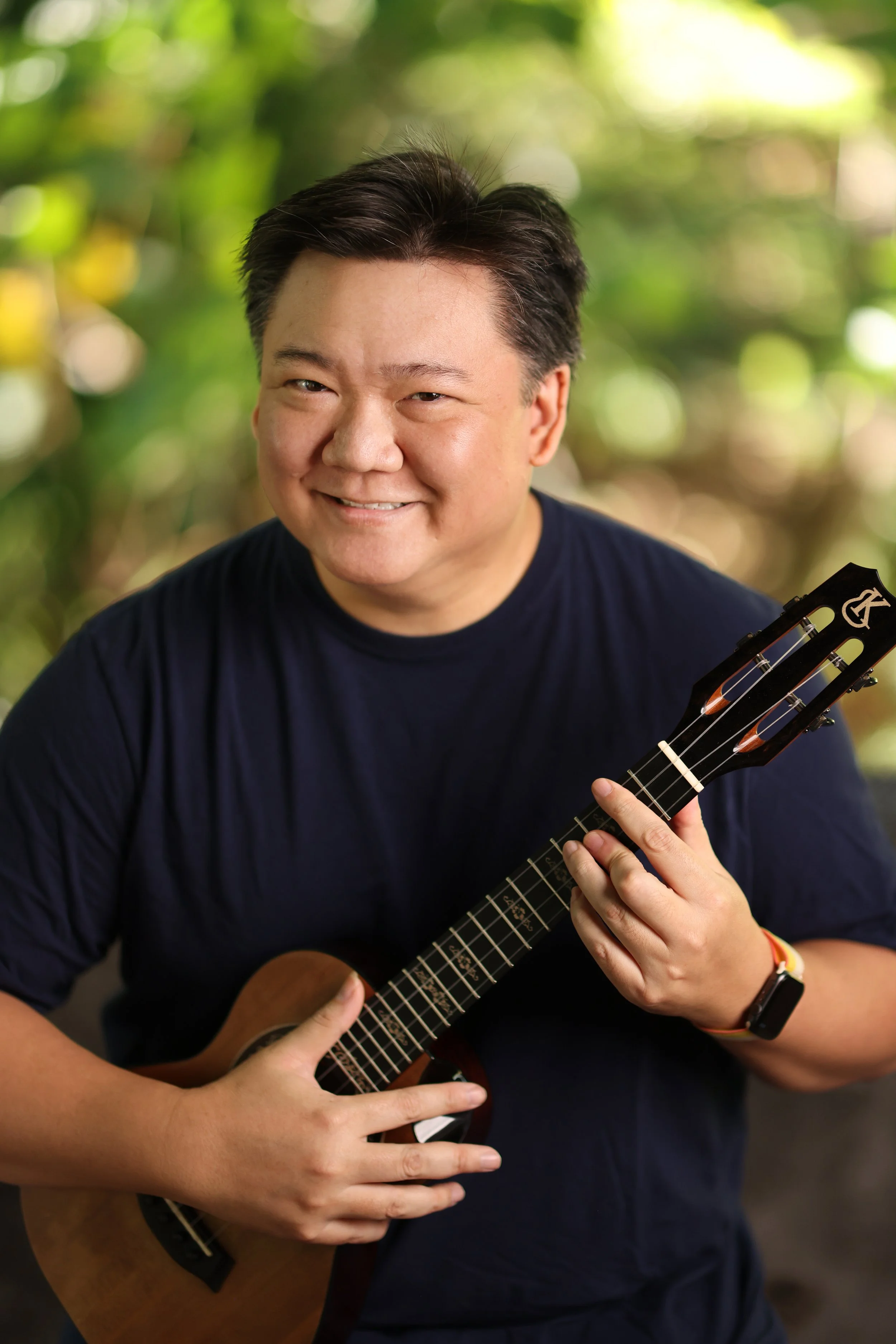 About Us — Four Strings at a Time