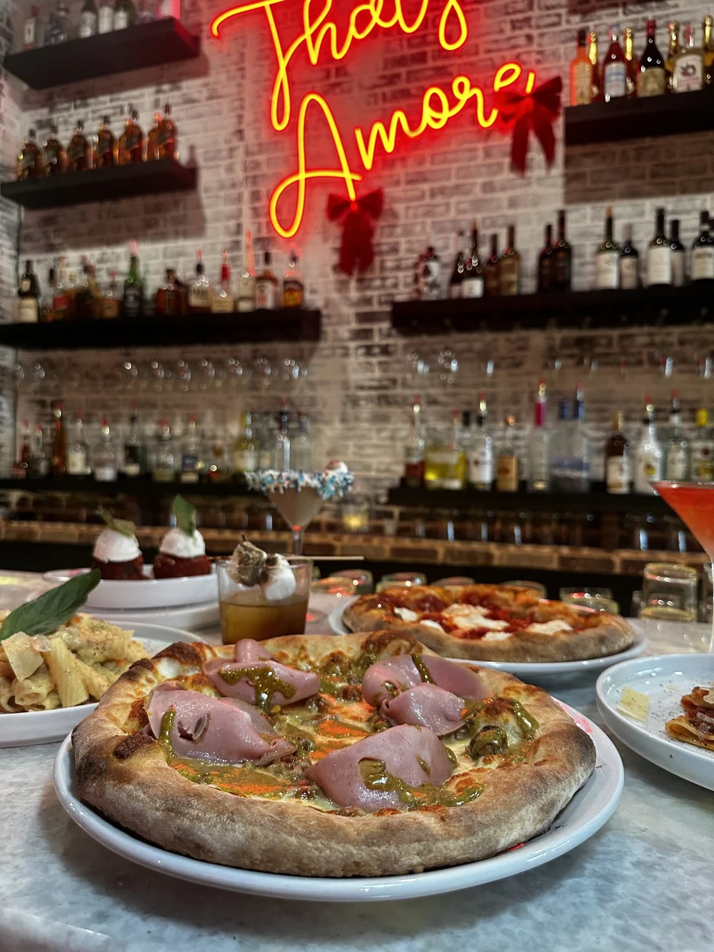 Pezzo Pictures — Pezzo Pizza + Bar l Best Pizza & Italian in Estero