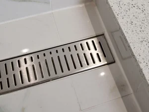 How to Stop Water Splashing Out of Your Walk-in Shower