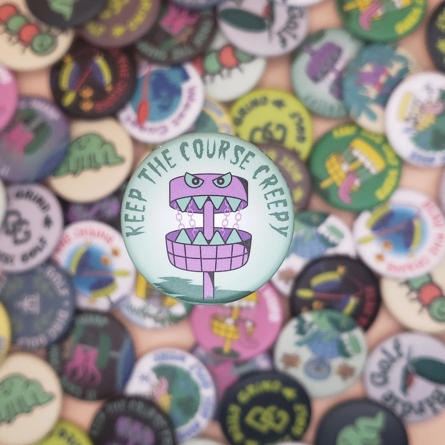 Purple Basket Monster Disc Golf Pinback Button — Daily Grind Disc Golf