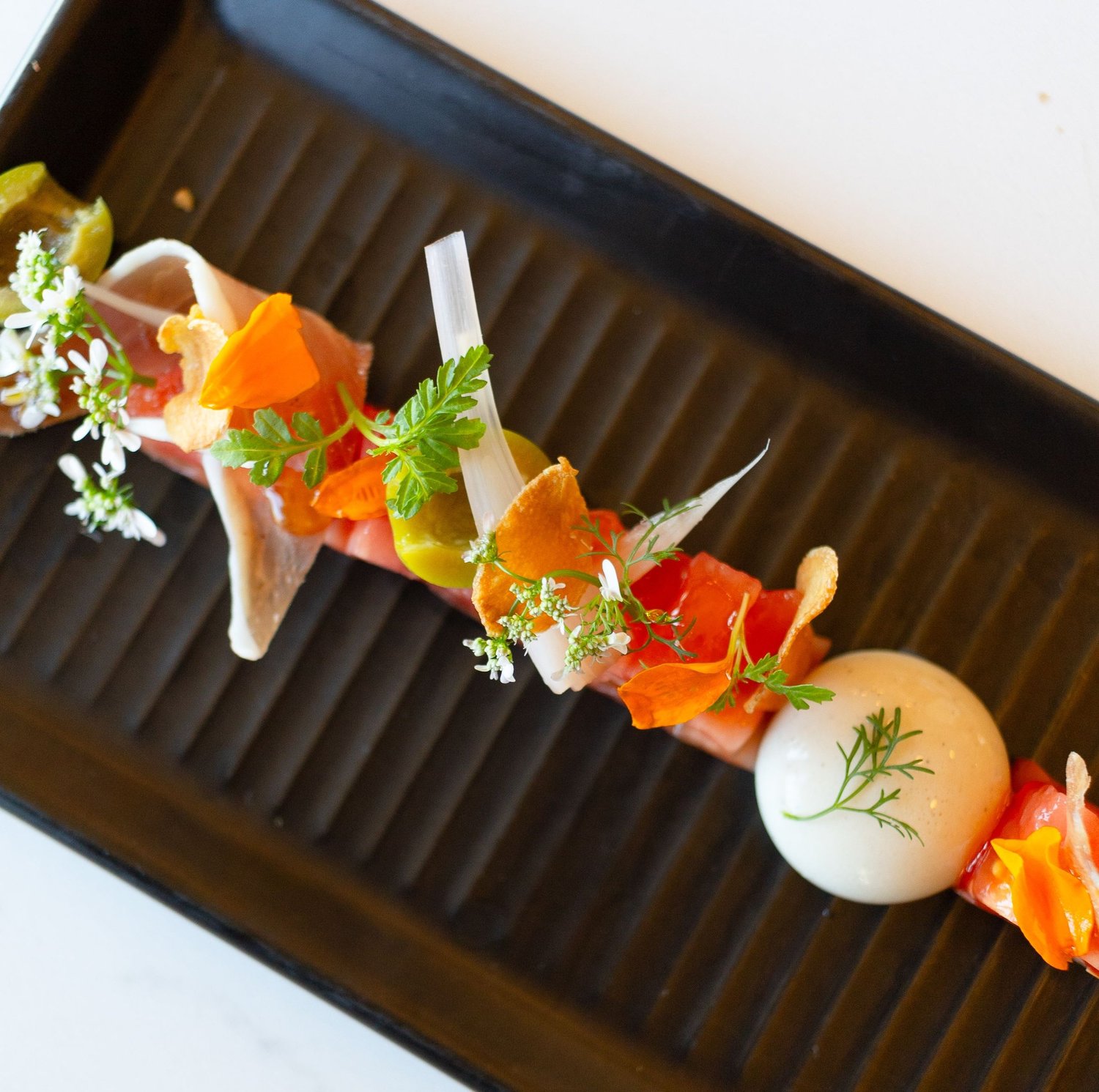 SIGNATURE TASTING MENU EXPERIENCE — Travail Kitchen and Amusements