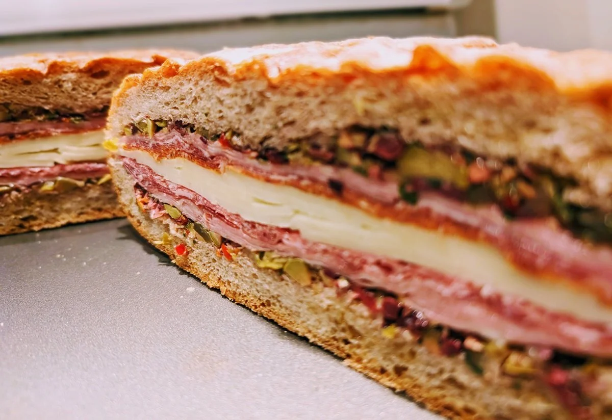 Authentic Muffaletta Sandwich with Homemade Olive Salad Recipe — One ...