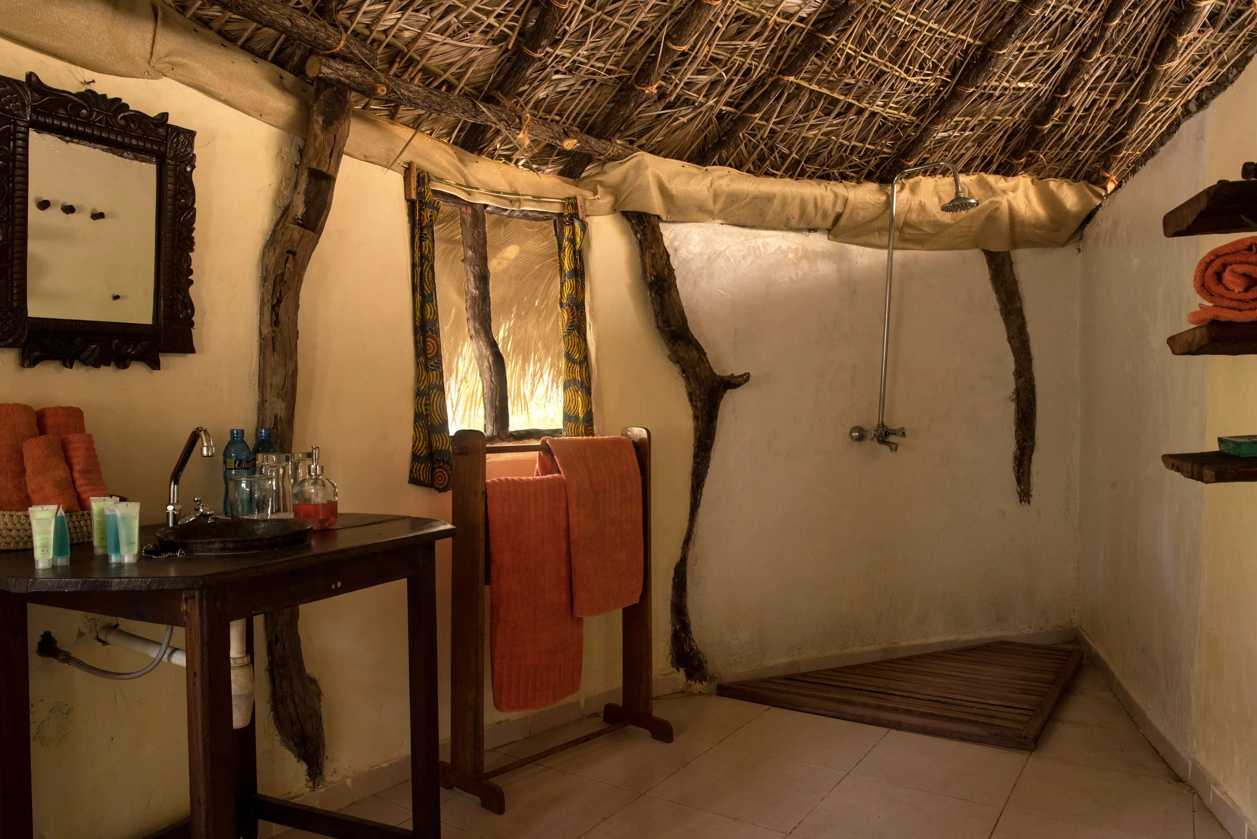 Selous Accommodation: Mudhut Rooms — Selous River Camp