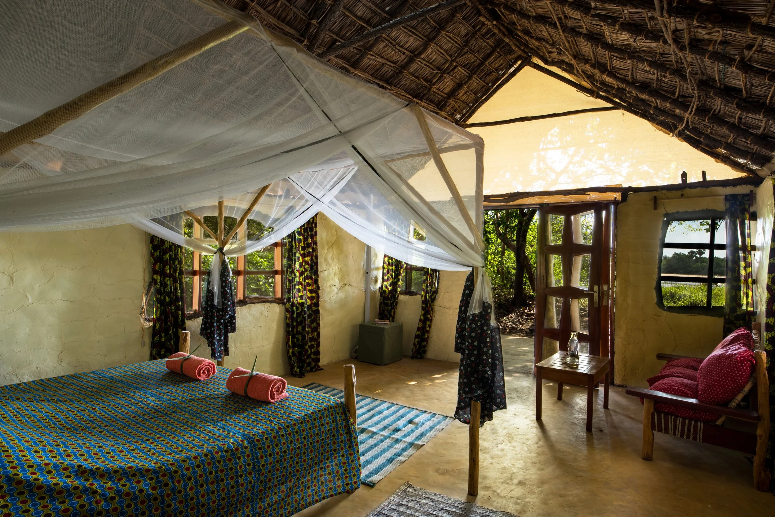 Selous Accommodation: Mudhut Rooms — Selous River Camp