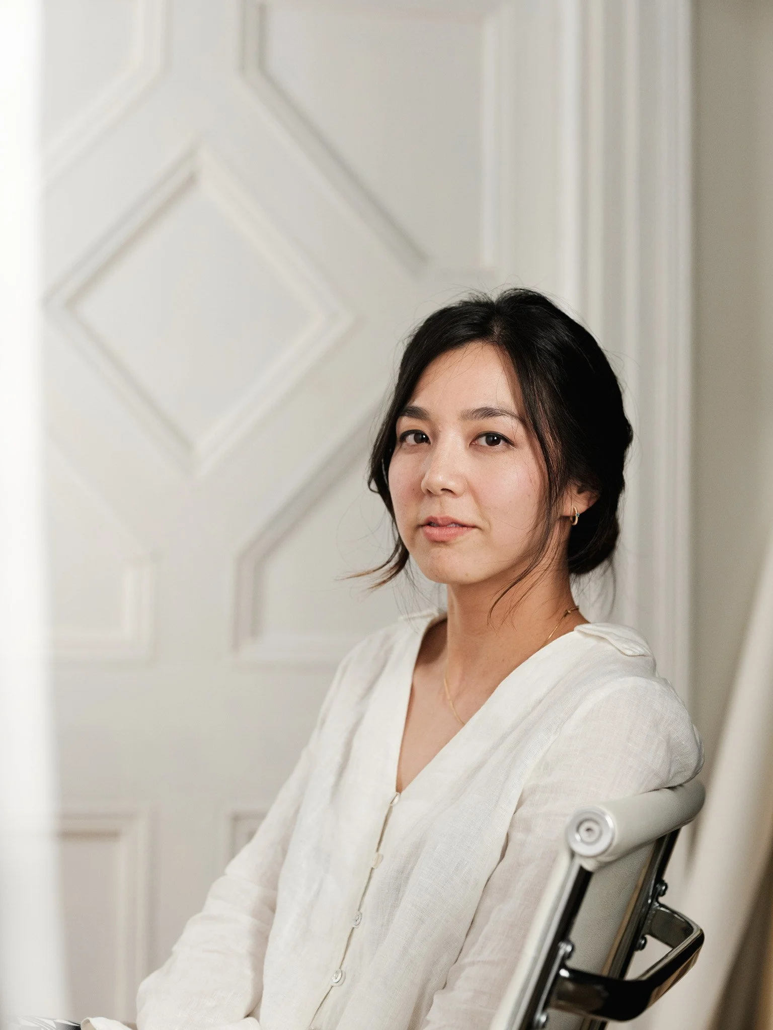 ABOUT — ELIZABETH LO