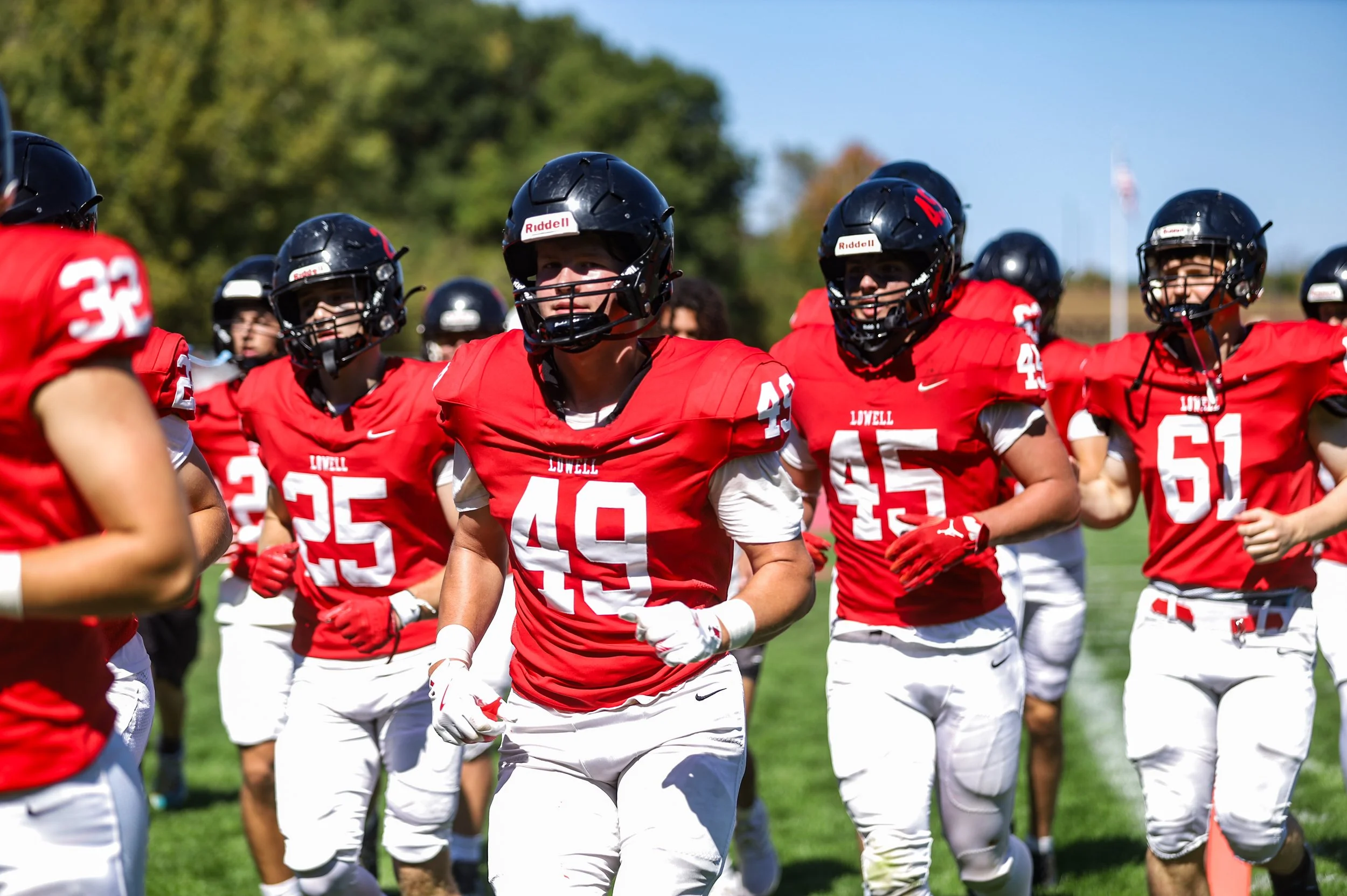 Red Arrows Wear Out Sentinels in 61-14 Win — Lowell Ledger