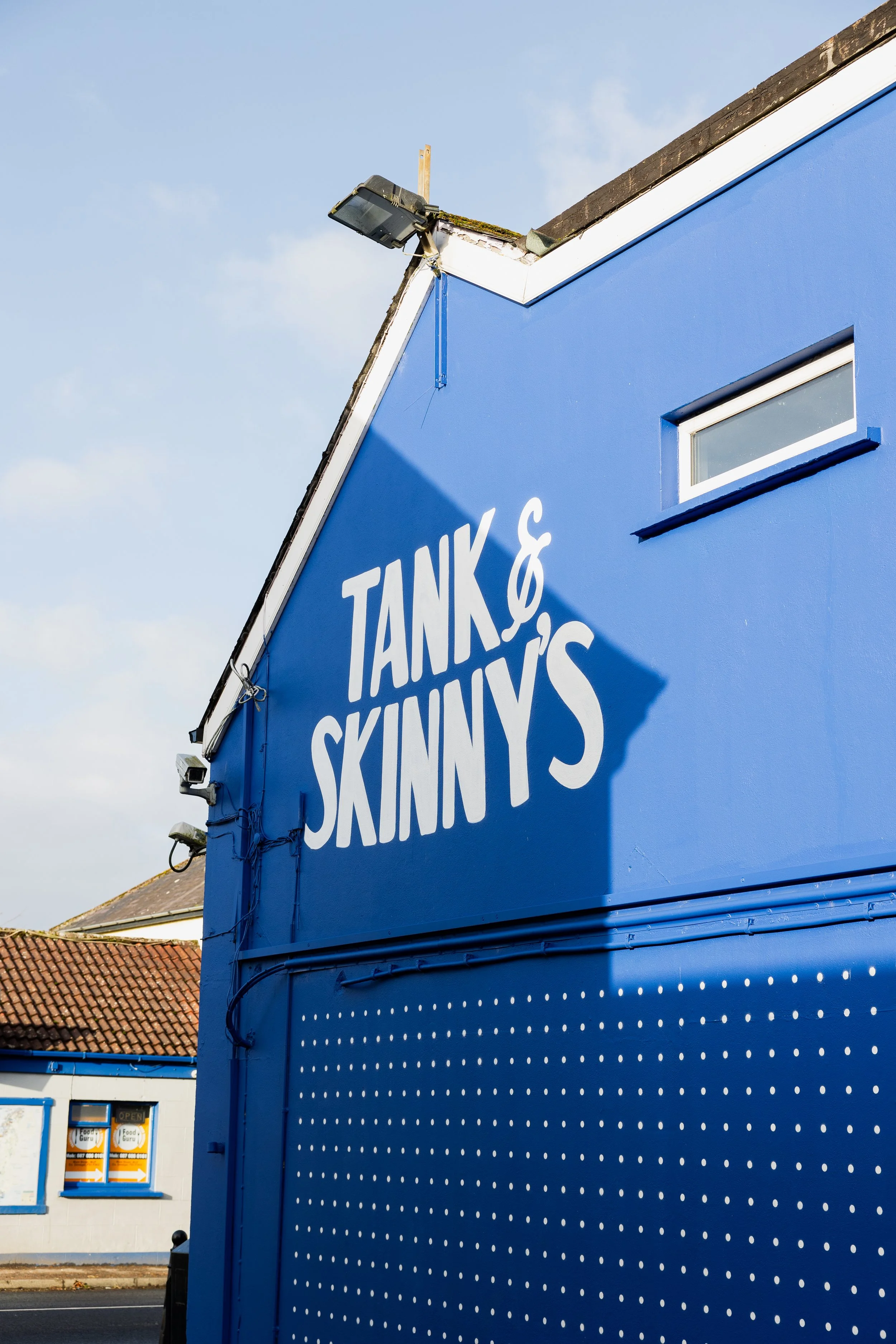 Clooney Road Tank & Skinny's — Tank & Skinny's